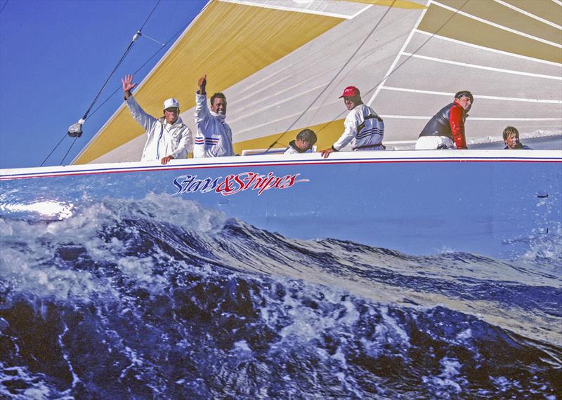 Tom Whidden and Dennis Conner salute well-wishers after reclaiming the ...