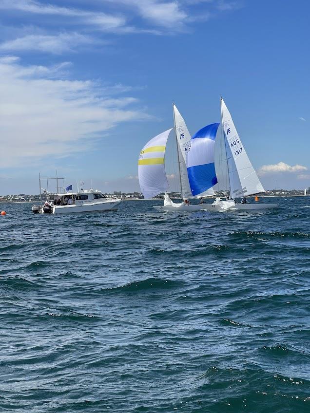 Tight racing right through the fleet on day one of the Etchells ...