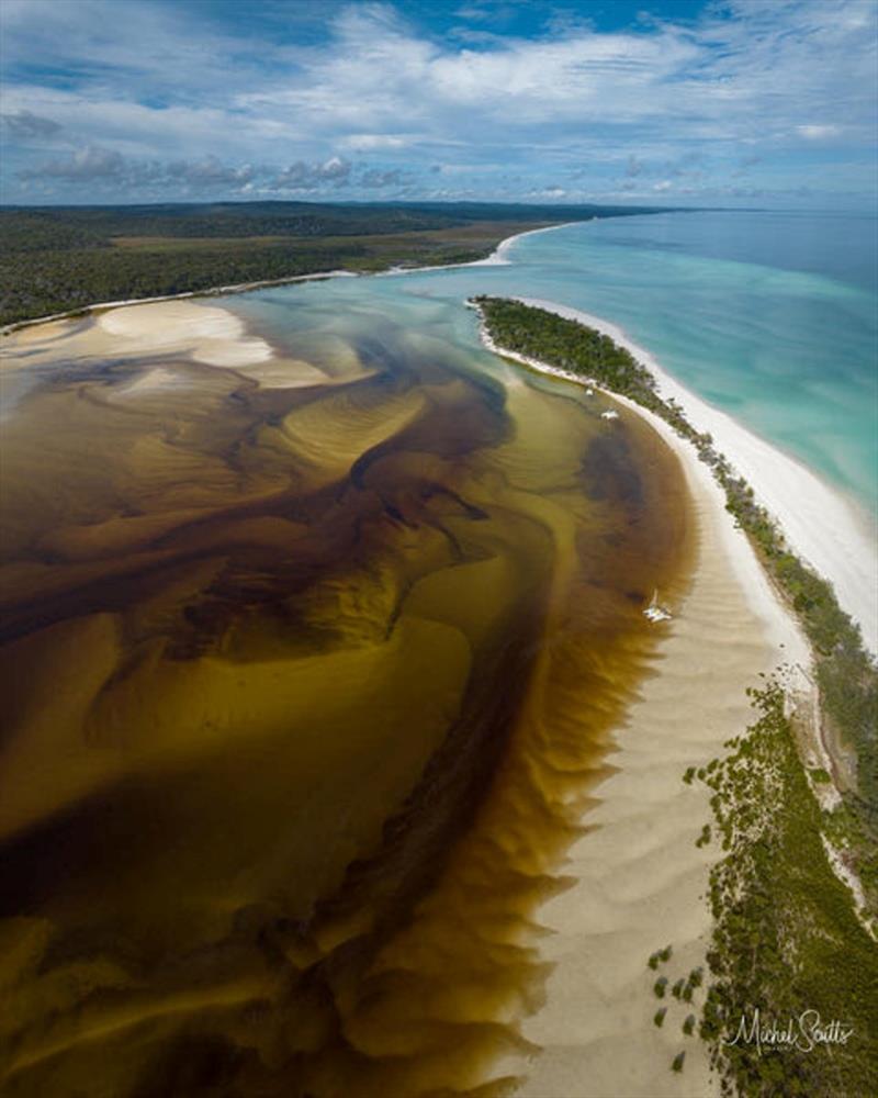 A cool aerial view of Wathumba Creek in Platypus Bay, looking south. A ...