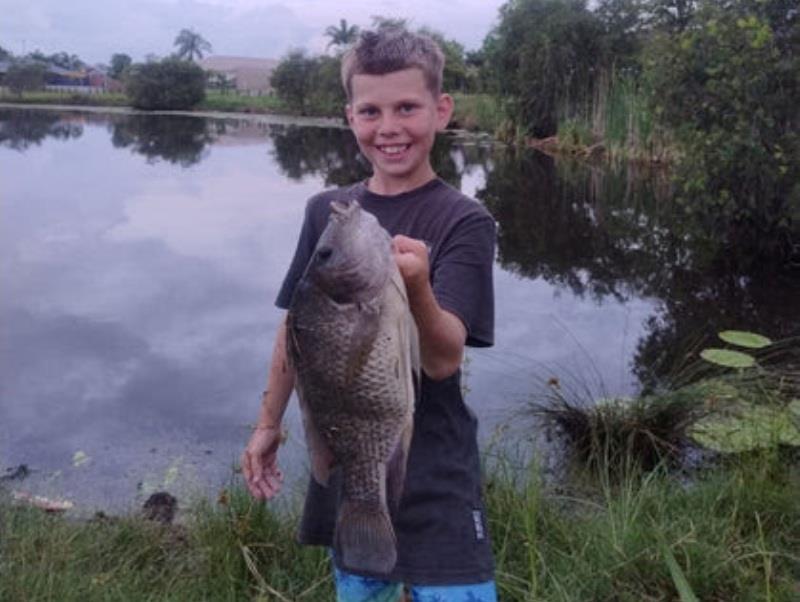 Kade Whittle hauled in this massive tilapia from a local lake. The ...