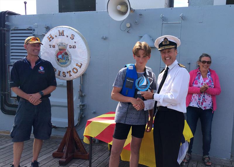Declan Hayes is awarded the Most Improved Sailor by Vice Admiral Paul ...
