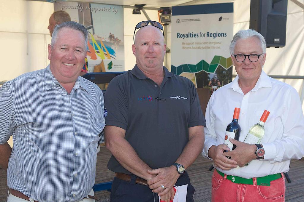 Richard Rowell accepted the Div 1 outright trophy from commodores Barry ...