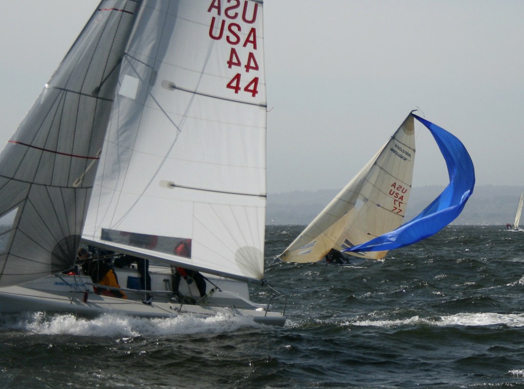 USA’s Stephen Pugh (44) surges into the leeward mark as Robert Harf’s ...