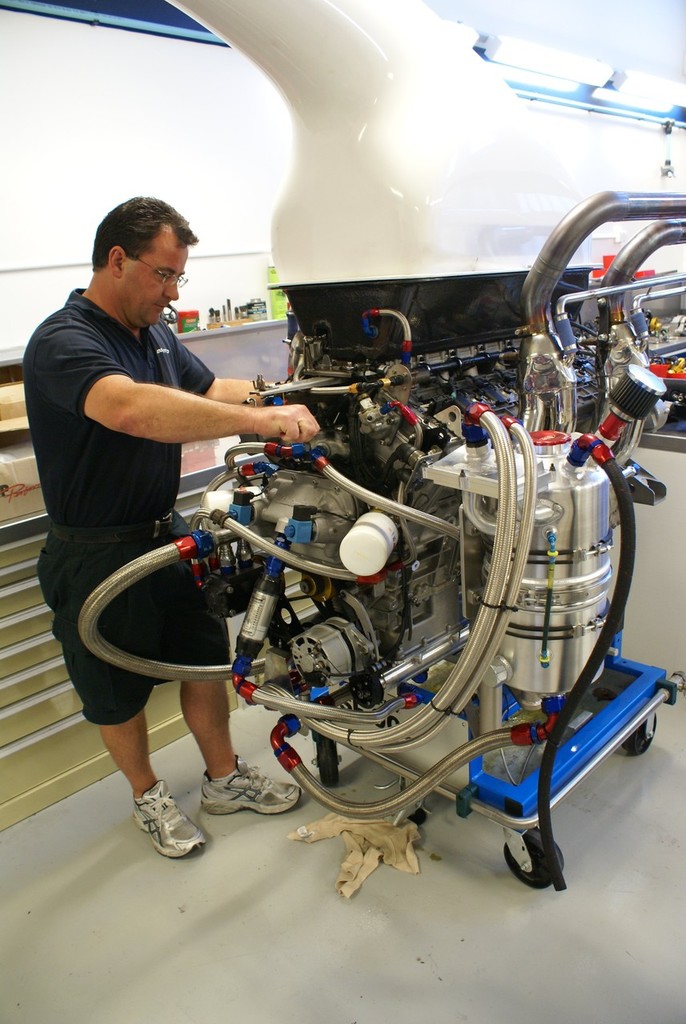 Maritimo Offshore Race Team engine builder Kurt Davies hard at it in ...