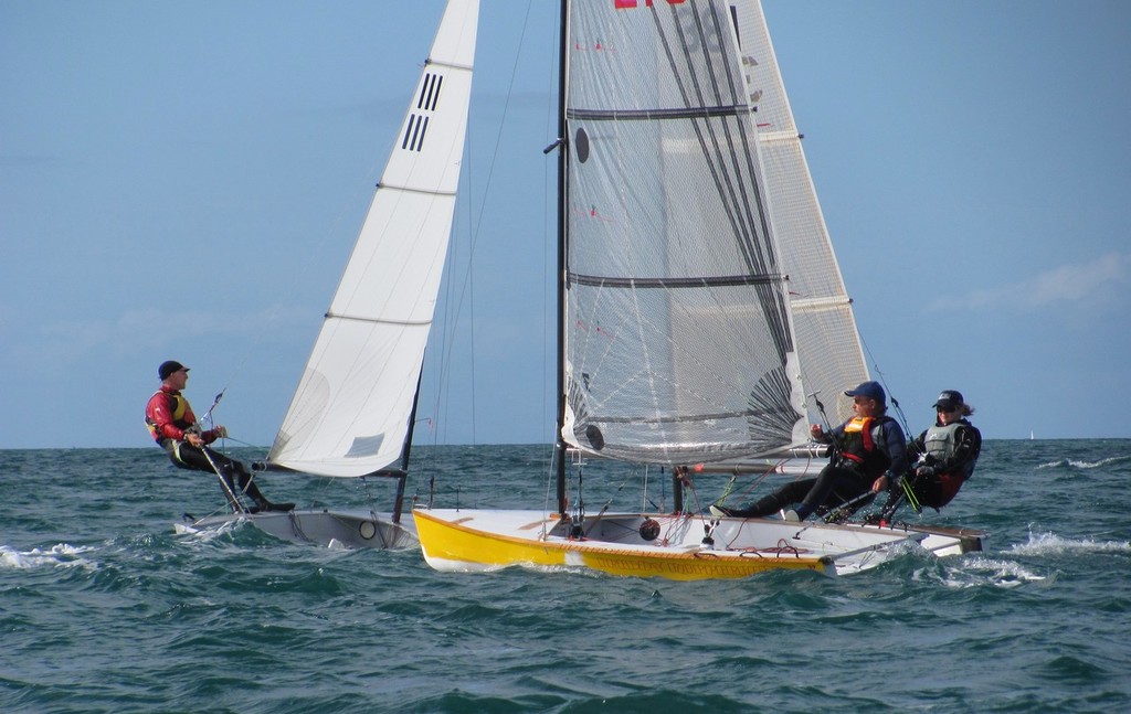 Crossing tacks after the start #111 Phil Ash on Port Katie de Lange and ...