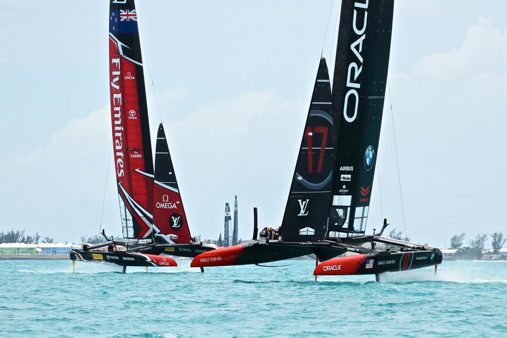 Emirates Team NZ passes astern of Oracle Team USA in Round Robin 2