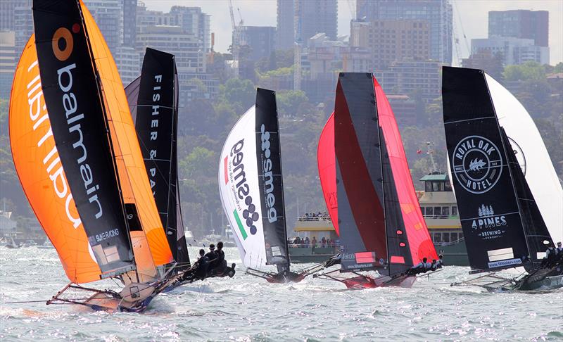 The fleet race downwind on the first lap - 18ft Skiff Spring ...